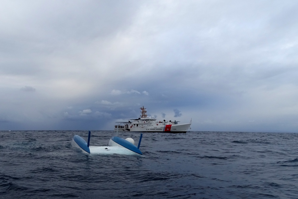 The Coast Guard and a Capsized Cat - Latitude38